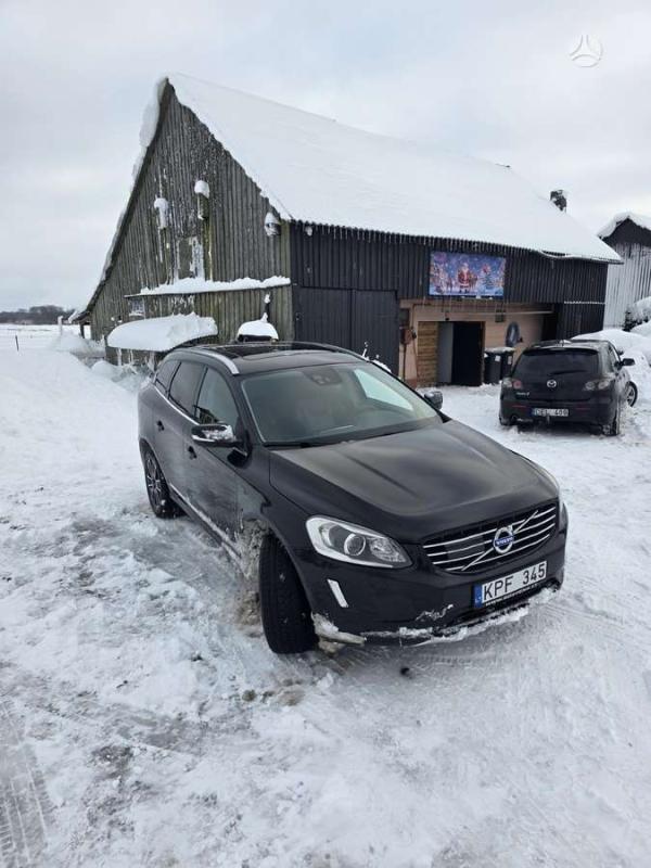 Black Volvo XC60 2015 in Gargzdai, with an engine capacity of 2.40 L and mileage of 300 thousand km for 10500 €, photo 3 on AUTOMOTO.COM.LV