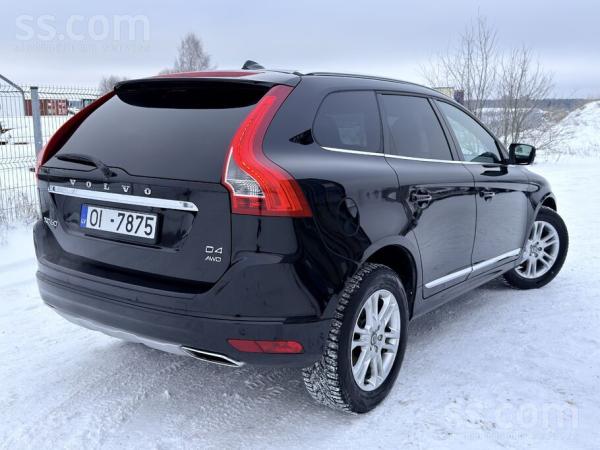 Black Volvo XC60 2015 in Riga, with an engine capacity of 2.40 L and mileage of 309 thousand km for 12995 €, photo 4 on AUTOMOTO.COM.LV
