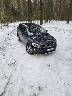 Black Volvo XC60 2015 in Vilnius, with an engine capacity of 2.40 L and mileage of 225 thousand km for 13800 €, photo 2 on AUTOMOTO.COM.LV