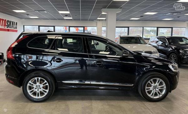Black Volvo XC60 2015 in Klaipeda, with an engine capacity of 2.40 L and mileage of 259 thousand km for 13900 €, photo 5 on AUTOMOTO.COM.LV