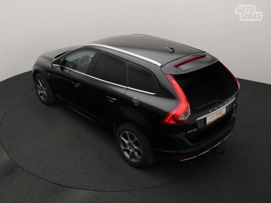 Black Volvo XC60 2015 in Vilnius, with an engine capacity of 2.00 L and mileage of 205 thousand km for 14899 €, photo 13 on AUTOMOTO.COM.LV