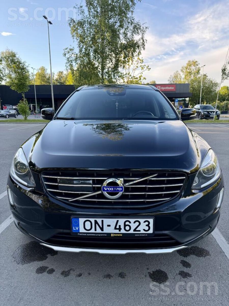 Black Volvo XC60 2015 in Riga, with an engine capacity of 2.40 L and mileage of 242 thousand km for 16550 €, photo 1 on AUTOMOTO.COM.LV