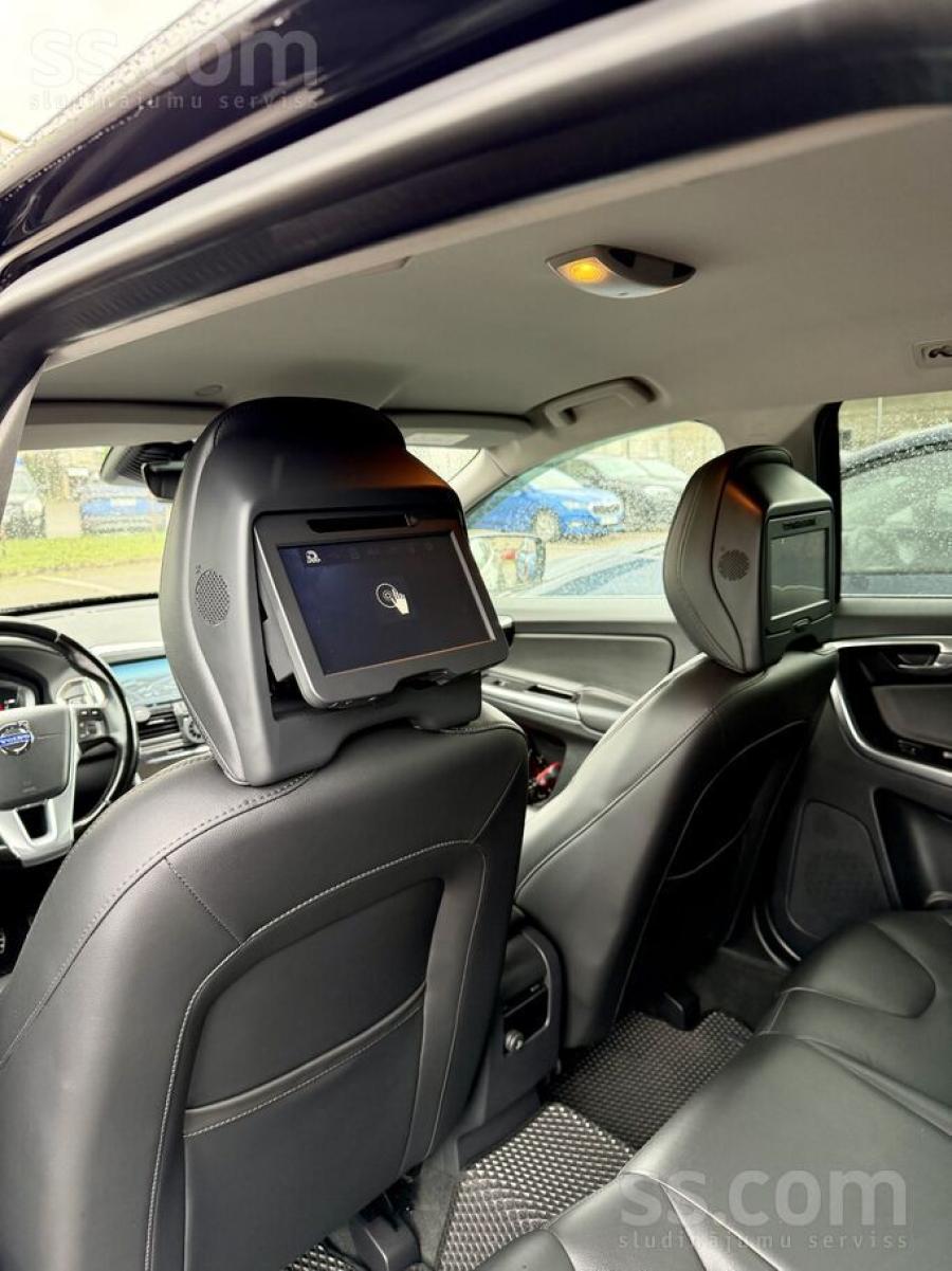 Black Volvo XC60 2015 in Riga, with an engine capacity of 2.40 L and mileage of 242 thousand km for 16550 €, photo 19 on AUTOMOTO.COM.LV