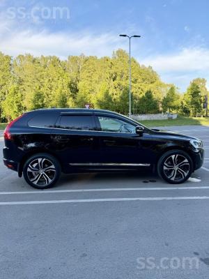 Black Volvo XC60 2015 in Riga, with an engine capacity of 2.40 L and mileage of 242 thousand km for 16550 €, photo 25 on AUTOMOTO.COM.LV
