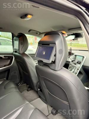 Black Volvo XC60 2015 in Riga, with an engine capacity of 2.40 L and mileage of 242 thousand km for 15650 €, photo 17 on AUTOMOTO.COM.LV
