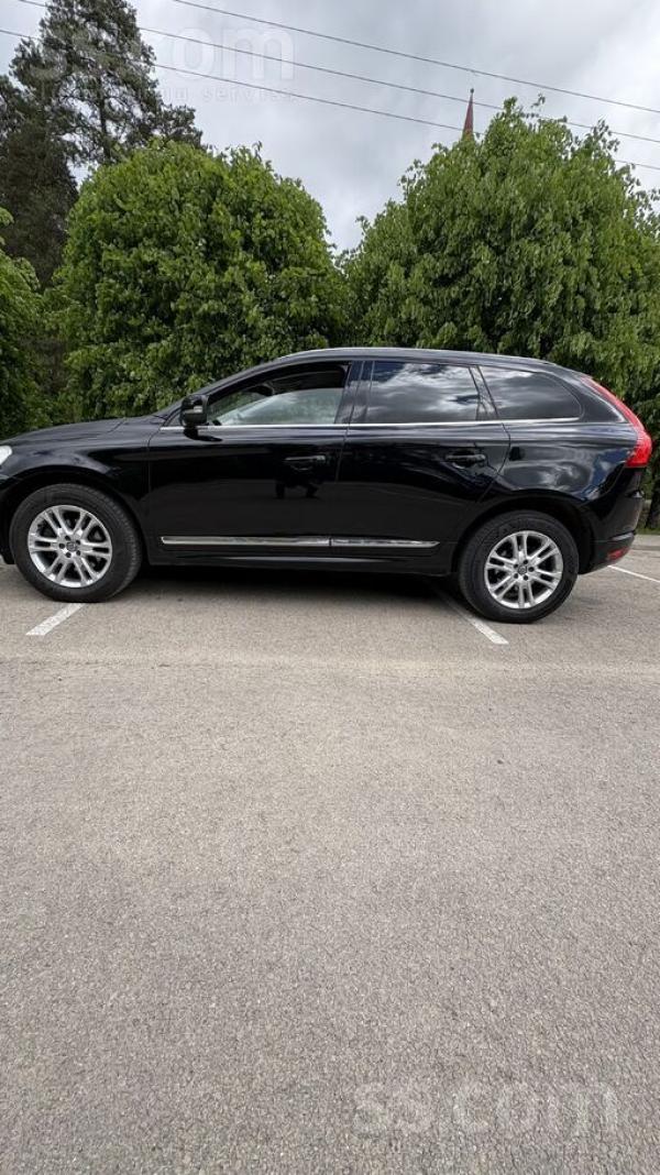 Black Volvo XC60 2015 in Ogre, with an engine capacity of 2.40 L and mileage of 201 thousand km for 14500 €, photo 6 on AUTOMOTO.COM.LV
