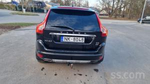 Black Volvo XC60 2015 in Riga, with an engine capacity of 2.40 L and mileage of 331 thousand km for 10500 €, photo 5 on AUTOMOTO.COM.LV