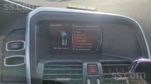 Black Volvo XC60 2015 in Riga, with an engine capacity of 2.40 L and mileage of 331 thousand km for 10500 €, photo 15 on AUTOMOTO.COM.LV