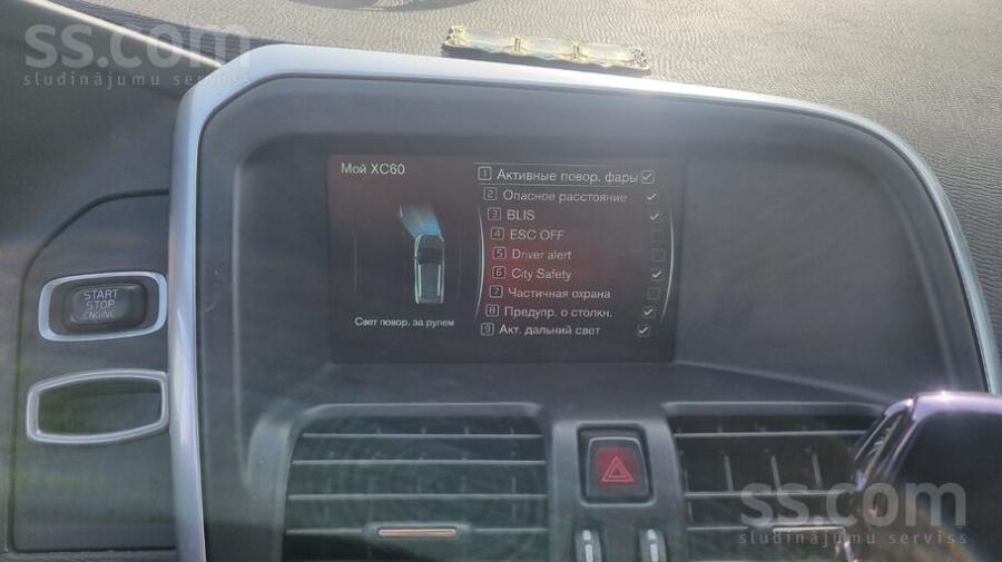 Black Volvo XC60 2015 in Riga, with an engine capacity of 2.40 L and mileage of 331 thousand km for 10500 €, photo 15 on AUTOMOTO.COM.LV