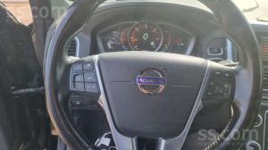 Black Volvo XC60 2015 in Riga, with an engine capacity of 2.40 L and mileage of 331 thousand km for 10500 €, photo 17 on AUTOMOTO.COM.LV