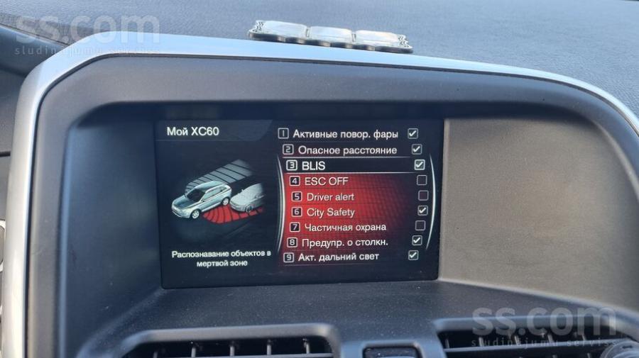Black Volvo XC60 2015 in Riga, with an engine capacity of 2.40 L and mileage of 331 thousand km for 10500 €, photo 25 on AUTOMOTO.COM.LV