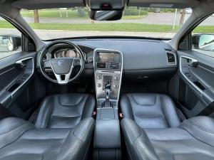 Black Volvo XC60 2015 in Riga, with an engine capacity of 2.40 L and mileage of 213 thousand km for 15000 €, photo 14 on AUTOMOTO.COM.LV