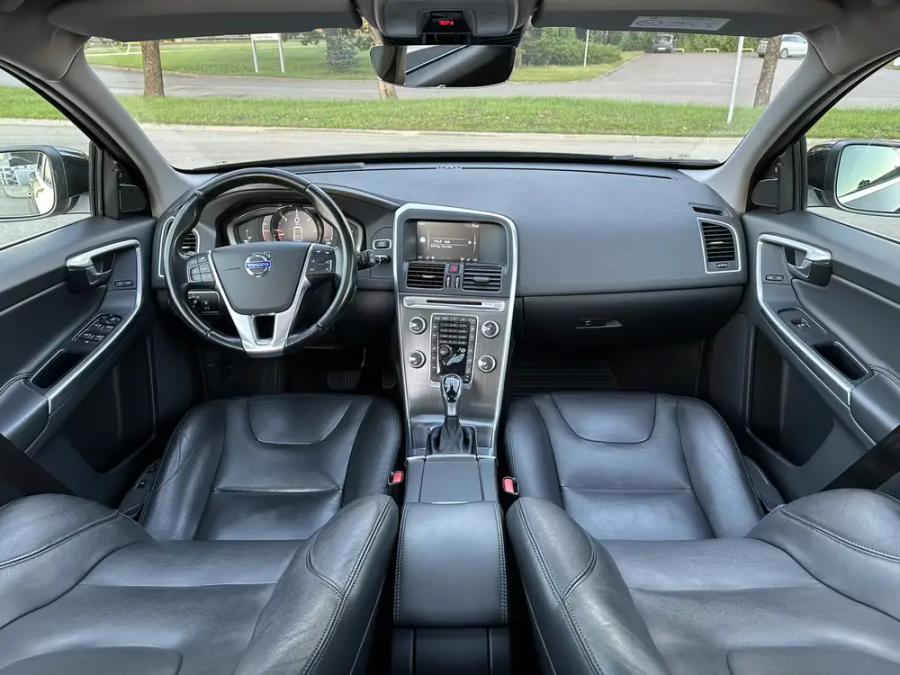 Black Volvo XC60 2015 in Riga, with an engine capacity of 2.40 L and mileage of 213 thousand km for 15000 €, photo 14 on AUTOMOTO.COM.LV