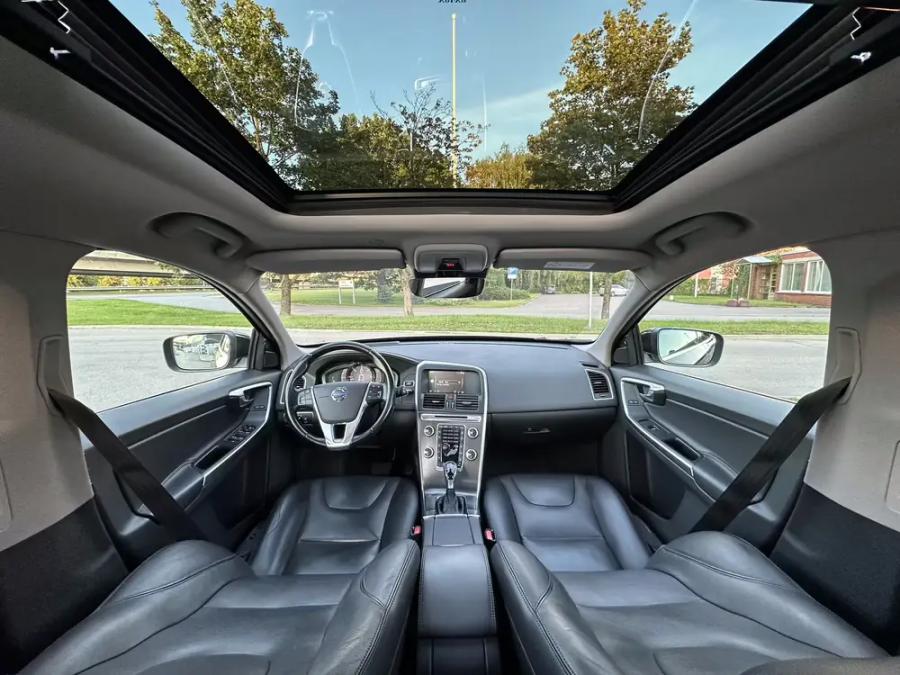 Black Volvo XC60 2015 in Riga, with an engine capacity of 2.40 L and mileage of 213 thousand km for 15000 €, photo 16 on AUTOMOTO.COM.LV