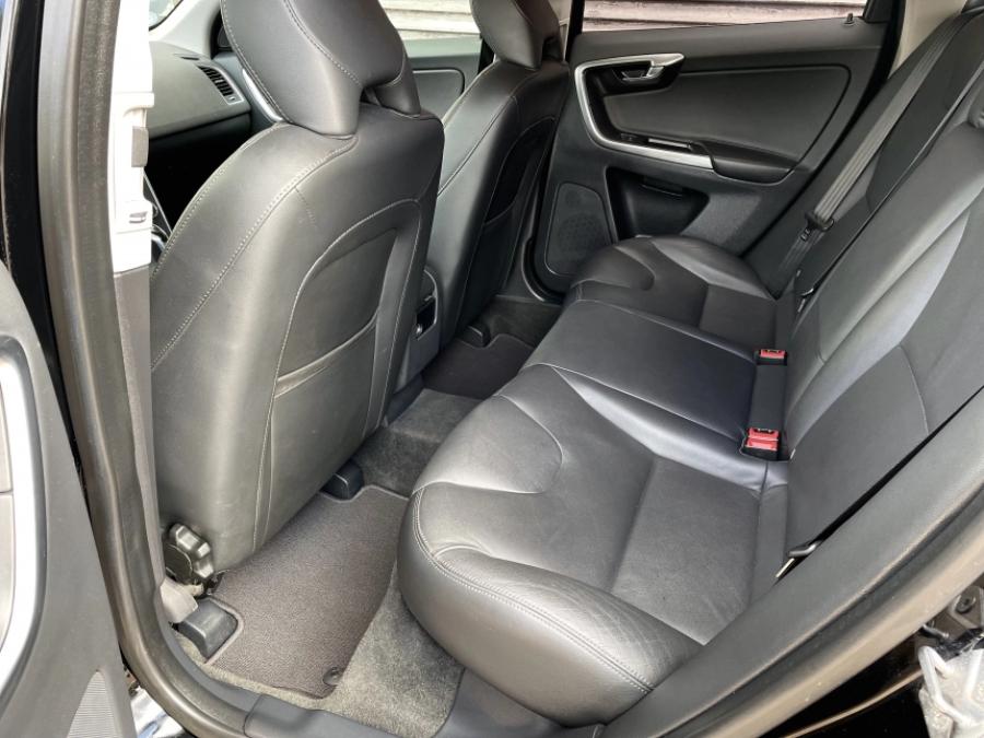 Black Volvo XC60 2015 in Riga, with an engine capacity of 2.00 L and mileage of 277 thousand km for 12590 €, photo 22 on AUTOMOTO.COM.LV