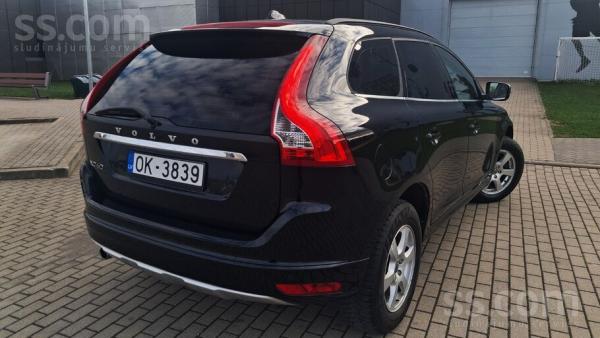 Black Volvo XC60 2015 in Riga, with an engine capacity of 2.00 L and mileage of 307 thousand km for 9850 €, photo 5 on AUTOMOTO.COM.LV