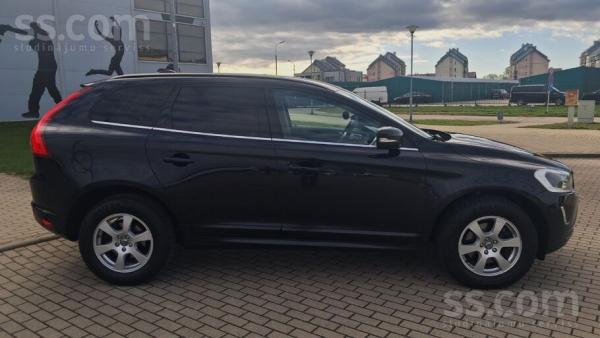 Black Volvo XC60 2015 in Riga, with an engine capacity of 2.00 L and mileage of 307 thousand km for 9850 €, photo 9 on AUTOMOTO.COM.LV