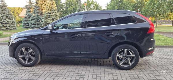 Black Volvo XC60 2015 in Marijampole, with an engine capacity of 2.40 L and mileage of 302 thousand km for 13300 €, photo 6 on AUTOMOTO.COM.LV