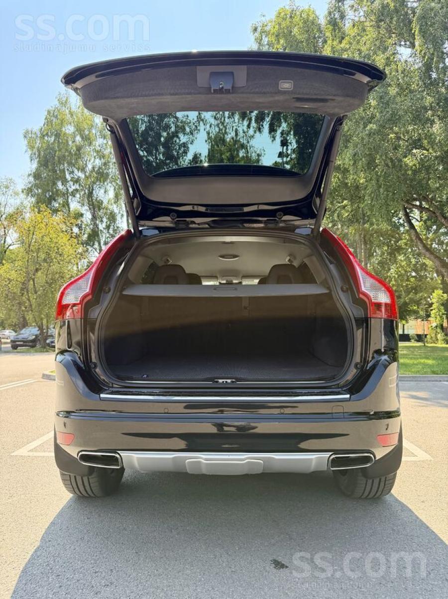 Black Volvo XC60 2015 in Riga, with an engine capacity of 2.40 L and mileage of 243 thousand km for 14100 €, photo 19 on AUTOMOTO.COM.LV