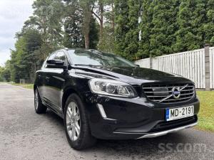 Black Volvo XC60 2015 in Riga, with an engine capacity of 2.00 L and mileage of 369 thousand km for 9290 €, photo  on AUTOMOTO.COM.LV