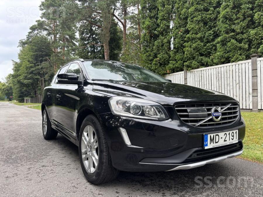 Black Volvo XC60 2015 in Riga, with an engine capacity of 2.00 L and mileage of 369 thousand km for 9290 €, photo 1 on AUTOMOTO.COM.LV