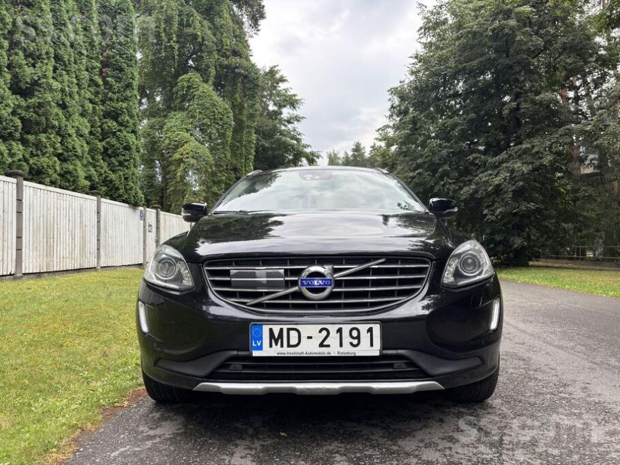 Black Volvo XC60 2015 in Riga, with an engine capacity of 2.00 L and mileage of 369 thousand km for 9290 €, photo 4 on AUTOMOTO.COM.LV
