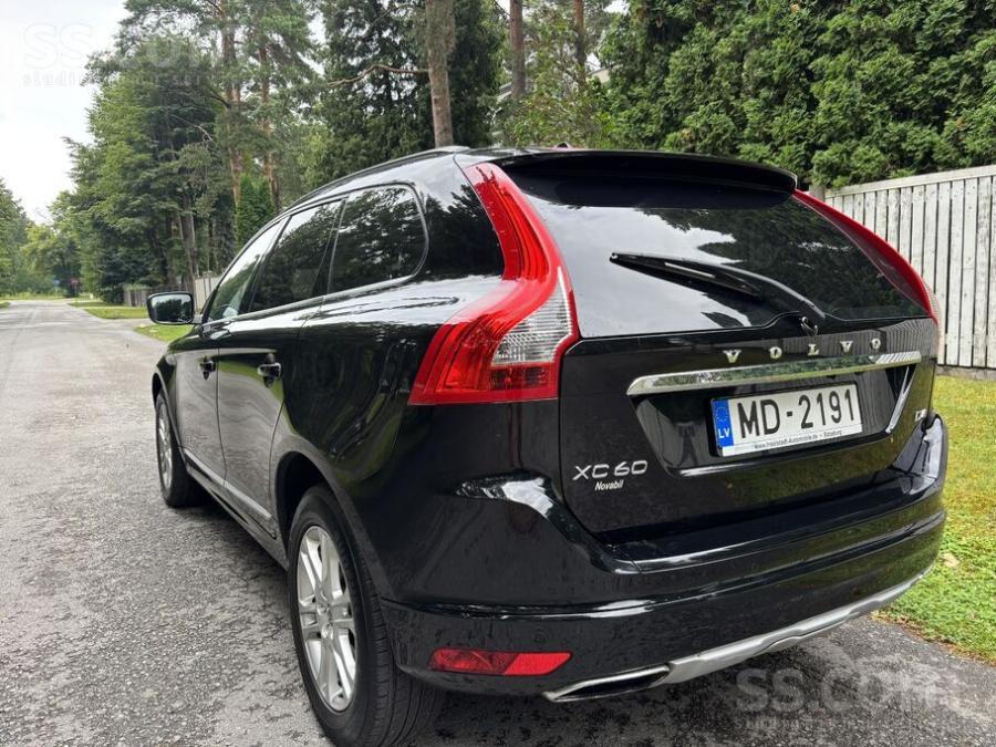 Black Volvo XC60 2015 in Riga, with an engine capacity of 2.00 L and mileage of 369 thousand km for 9290 €, photo 5 on AUTOMOTO.COM.LV