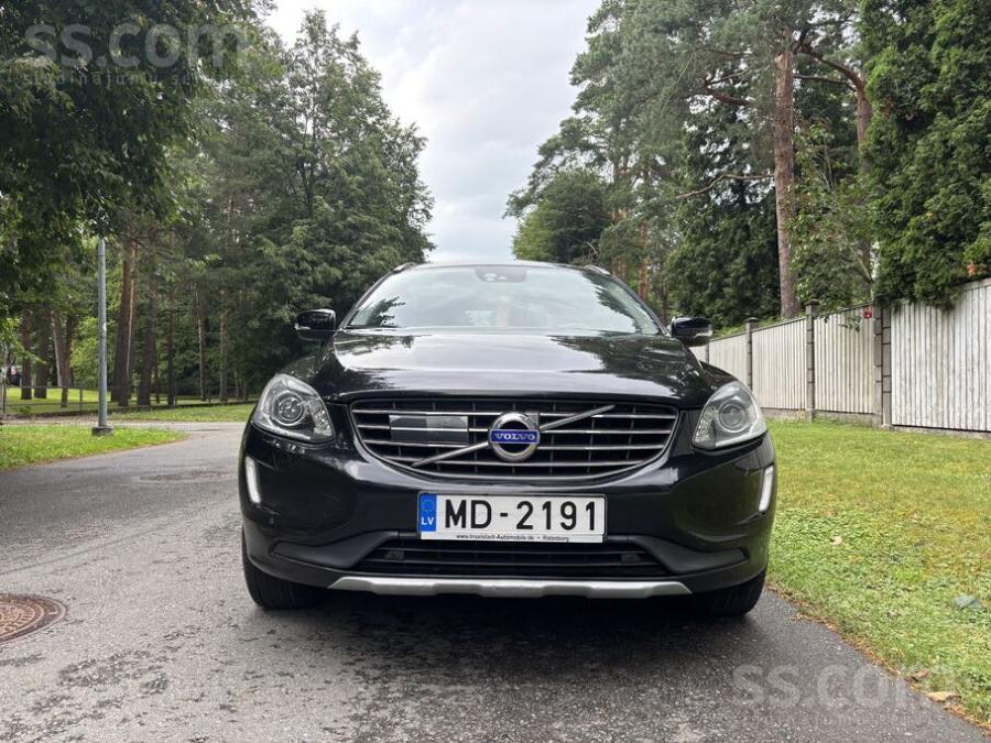 Black Volvo XC60 2015 in Riga, with an engine capacity of 2.00 L and mileage of 369 thousand km for 9290 €, photo 9 on AUTOMOTO.COM.LV