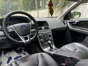 Black Volvo XC60 2015 in Riga, with an engine capacity of 2.00 L and mileage of 369 thousand km for 9290 €, photo 11 on AUTOMOTO.COM.LV