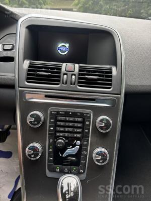Black Volvo XC60 2015 in Riga, with an engine capacity of 2.00 L and mileage of 369 thousand km for 9290 €, photo 14 on AUTOMOTO.COM.LV