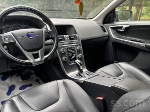 Black Volvo XC60 2015 in Riga, with an engine capacity of 2.00 L and mileage of 369 thousand km for 9290 €, photo 18 on AUTOMOTO.COM.LV