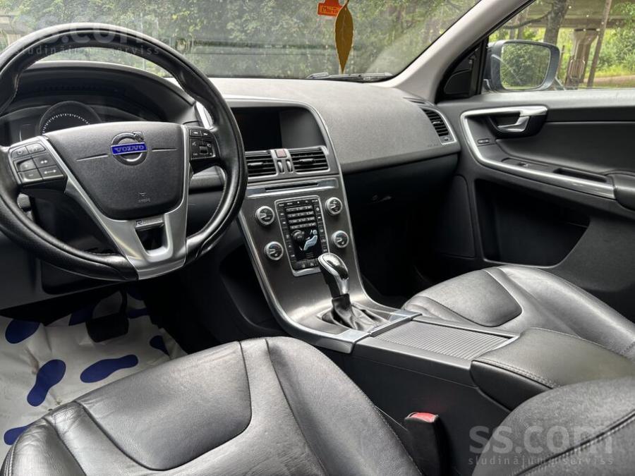 Black Volvo XC60 2015 in Riga, with an engine capacity of 2.00 L and mileage of 369 thousand km for 9290 €, photo 18 on AUTOMOTO.COM.LV