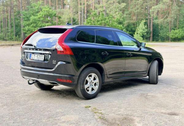 Black Volvo XC60 2015 in Jurmala, with an engine capacity of 2.40 L and mileage of 320 thousand km for 9500 €, photo 4 on AUTOMOTO.COM.LV