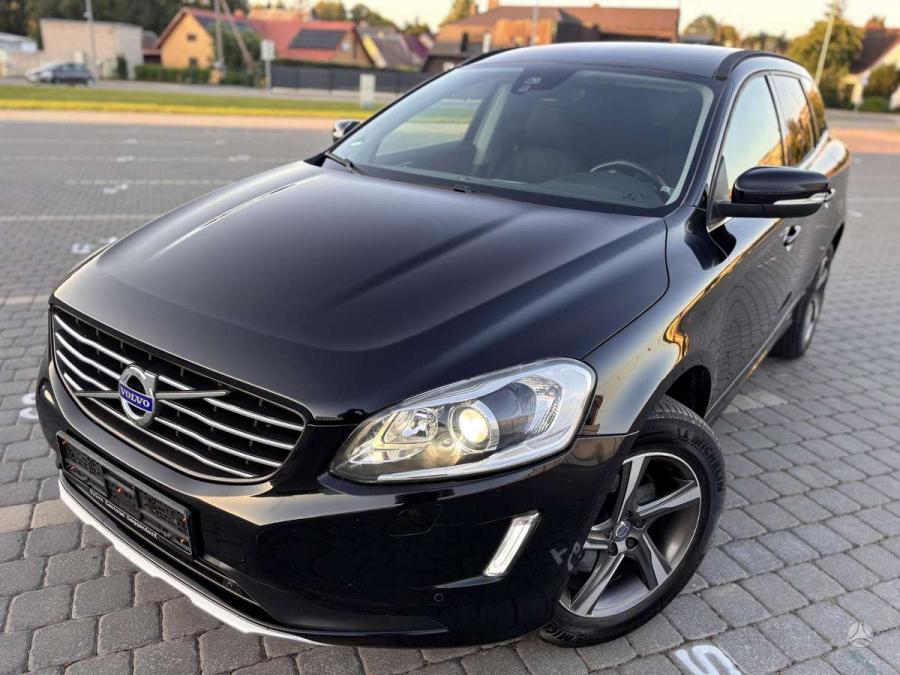 Black Volvo XC60 2015 in Raseiniai, with an engine capacity of 1.98 L and mileage of 281 thousand km for 11500 €, photo 3 on AUTOMOTO.COM.LV