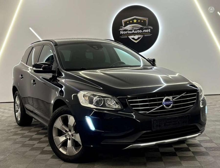 Black Volvo XC60 2015 in Marijampole, with an engine capacity of 2.40 L and mileage of 237 thousand km for 12950 €, photo 1 on AUTOMOTO.COM.LV