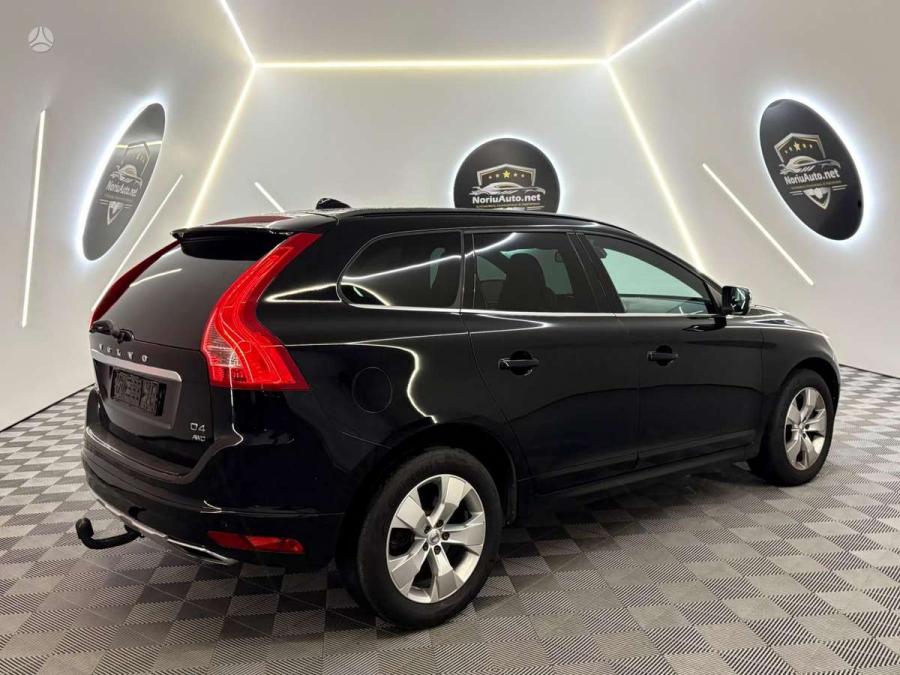 Black Volvo XC60 2015 in Marijampole, with an engine capacity of 2.40 L and mileage of 237 thousand km for 12950 €, photo 6 on AUTOMOTO.COM.LV