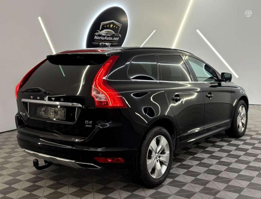 Black Volvo XC60 2015 in Marijampole, with an engine capacity of 2.40 L and mileage of 237 thousand km for 12950 €, photo 26 on AUTOMOTO.COM.LV