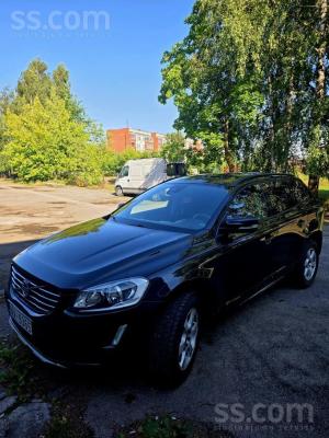 Black Volvo XC60 2015 in Riga, with an engine capacity of 2.00 L and mileage of 215 thousand km for 9000 €, photo 8 on AUTOMOTO.COM.LV