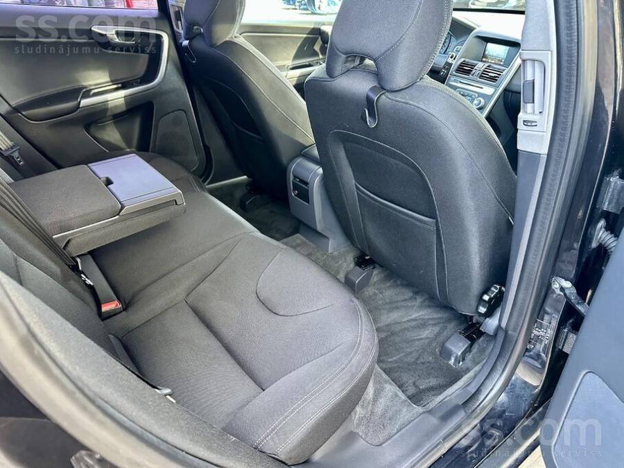 Black Volvo XC60 2015 in Riga, with an engine capacity of 2.00 L and mileage of 0 thousand km for 7990 €, photo 13 on AUTOMOTO.COM.LV