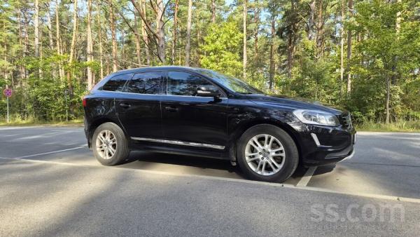 Black Volvo XC60 2015 in Riga, with an engine capacity of 2.40 L and mileage of 336 thousand km for 8690 €, photo 7 on AUTOMOTO.COM.LV