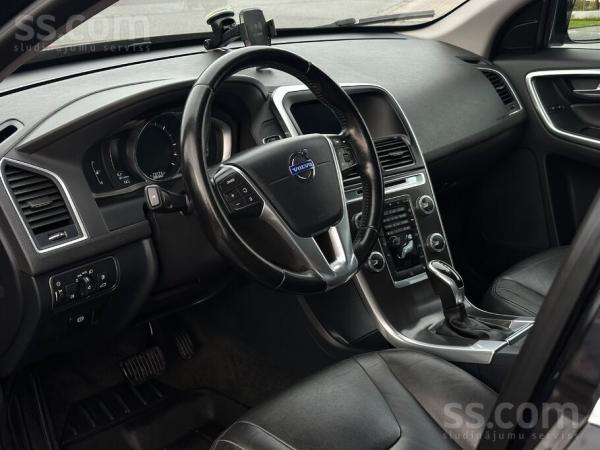 Volvo XC60 2015 Rīga vietnē Melns Volvo XC60 2015 Rīga, ar dzinēja tilpumu 2.00 L un nobraukumu 286 tūkst. km par 9500 €, foto 5 vietnē AUTOMOTO.COM.LV