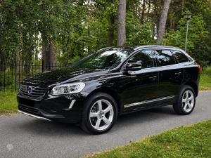 Black Volvo XC60 2015 in Vilnius, with an engine capacity of 2.40 L and mileage of 314 thousand km for 12890 €, photo 8 on AUTOMOTO.COM.LV