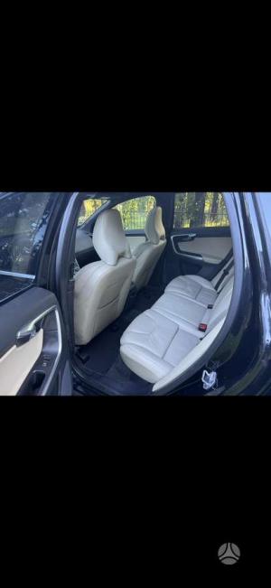 Black Volvo XC60 2015 in Vilnius, with an engine capacity of 2.40 L and mileage of 314 thousand km for 12890 €, photo 16 on AUTOMOTO.COM.LV