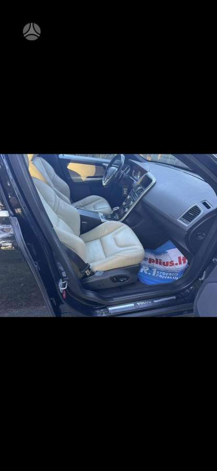 Black Volvo XC60 2015 in Vilnius, with an engine capacity of 2.40 L and mileage of 314 thousand km for 12890 €, photo 18 on AUTOMOTO.COM.LV