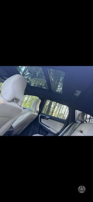 Black Volvo XC60 2015 in Vilnius, with an engine capacity of 2.40 L and mileage of 314 thousand km for 12890 €, photo 26 on AUTOMOTO.COM.LV