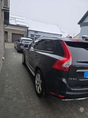 Black Volvo XC60 2016 in Taurage, with an engine capacity of 2.40 L and mileage of 120 thousand km for 14300 €, photo 13 on AUTOMOTO.COM.LV