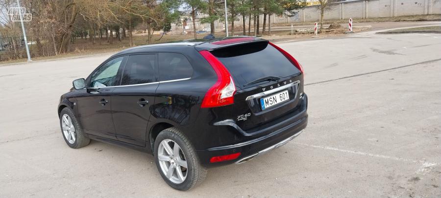 Black Volvo XC60 2016 in Taurage, with an engine capacity of 2.40 L and mileage of 256 thousand km for 15800 €, photo 3 on AUTOMOTO.COM.LV