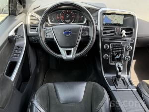 Black Volvo XC60 2016 in Riga, with an engine capacity of 2.00 L and mileage of 178 thousand km for 14900 €, photo 6 on AUTOMOTO.COM.LV