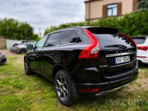Black Volvo XC60 2016 in Riga, with an engine capacity of 2.00 L and mileage of 338 thousand km for 8200 €, photo 5 on AUTOMOTO.COM.LV