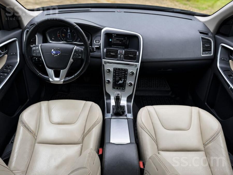 Black Volvo XC60 2016 in Riga, with an engine capacity of 2.00 L and mileage of 338 thousand km for 8200 €, photo 10 on AUTOMOTO.COM.LV